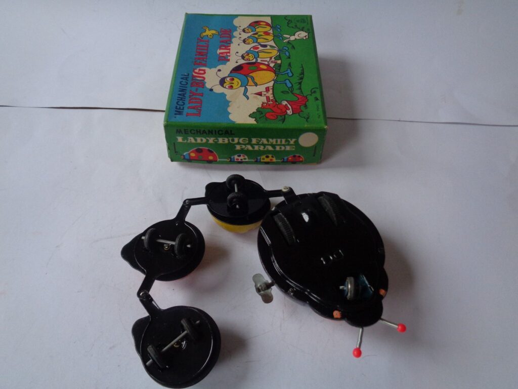 T.P.S. Lady-Bug Family Parade with Box (wind-up) - Toy Paradise