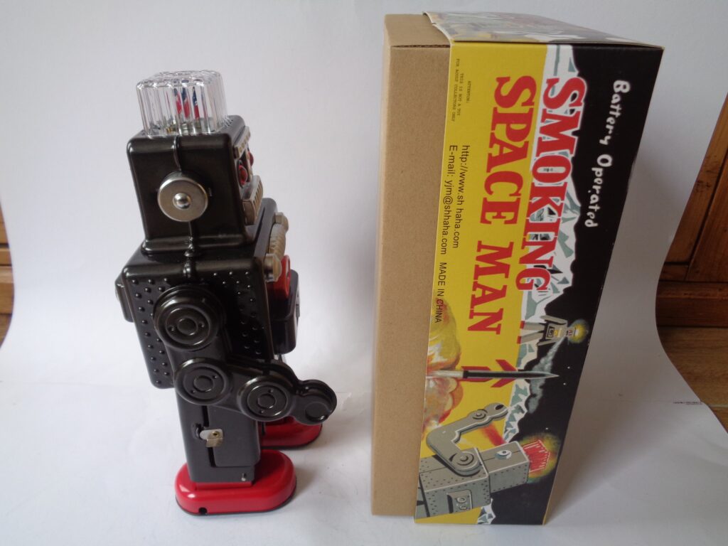 Ha Ha Toy Smoking Spaceman Robot with Box (battery-operated) - Toy Paradise