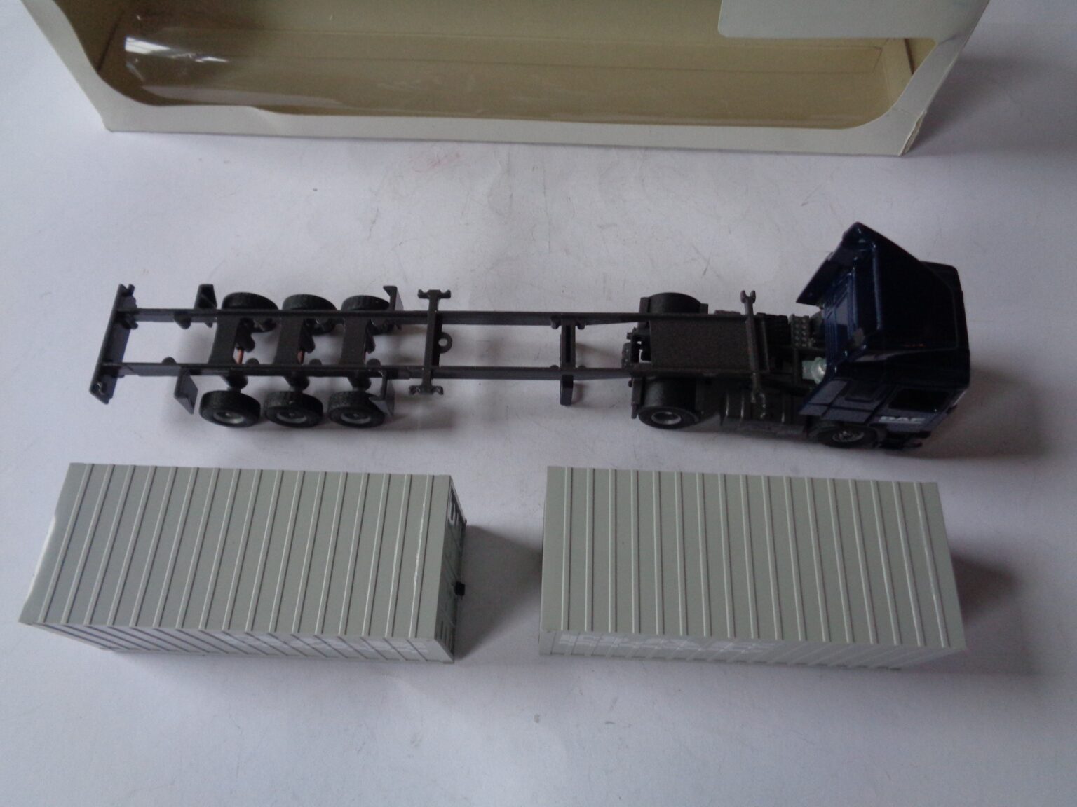 Tekno DAF 95 380 XF with Trailer and 2 Containers with Box - Toy Paradise